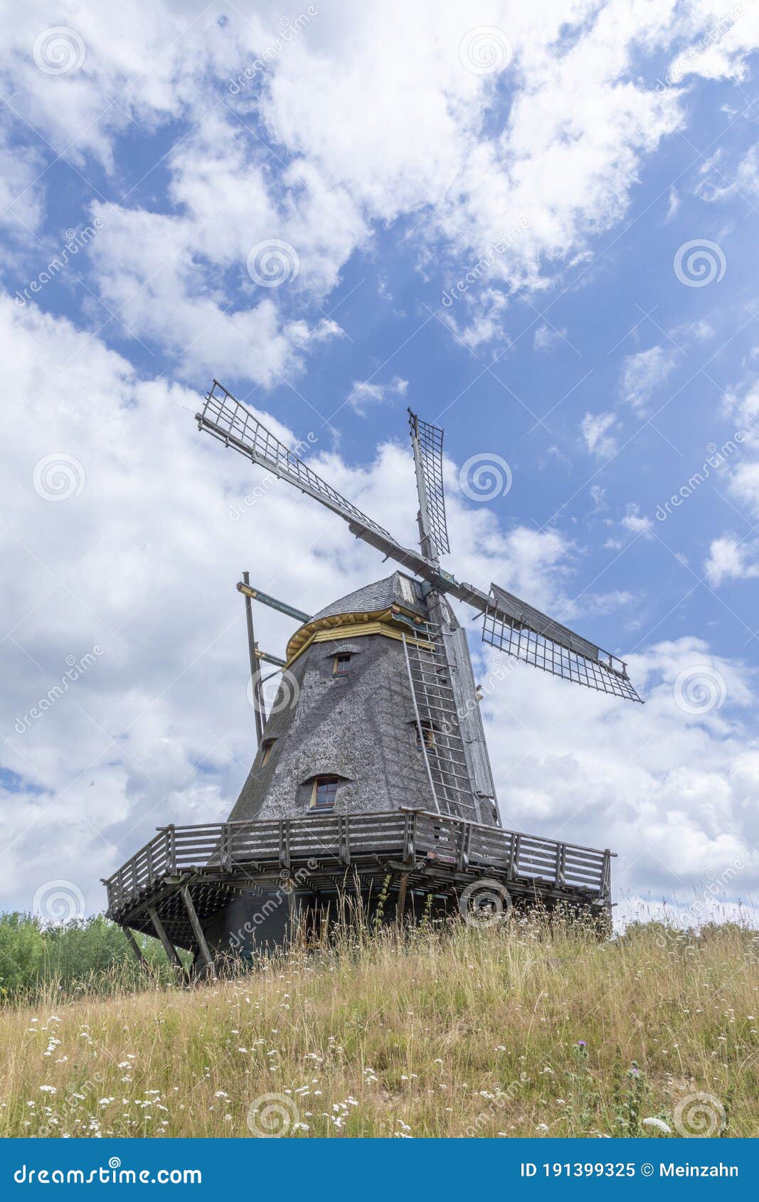 Windmill in Rural Landscape with Blue and Cloudy Sky Stock Image ...