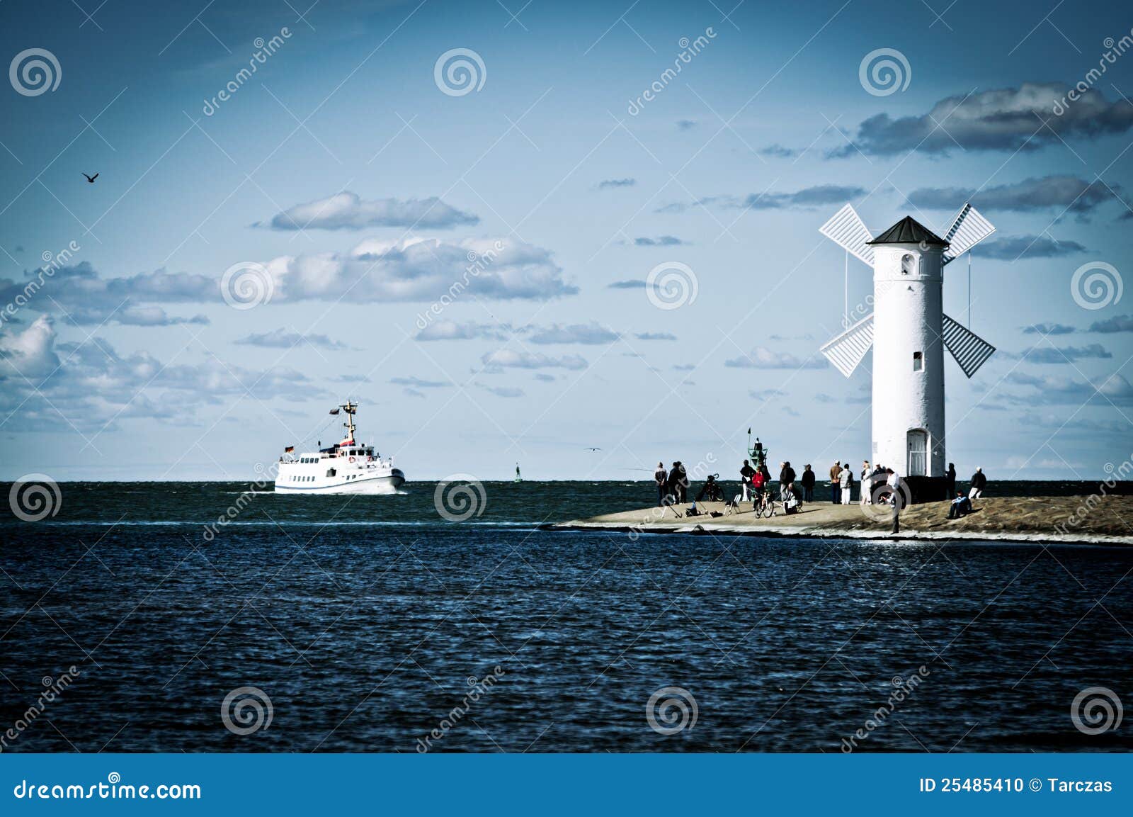 Windmill on the seashore stock photo. Image of seashore - 25485410