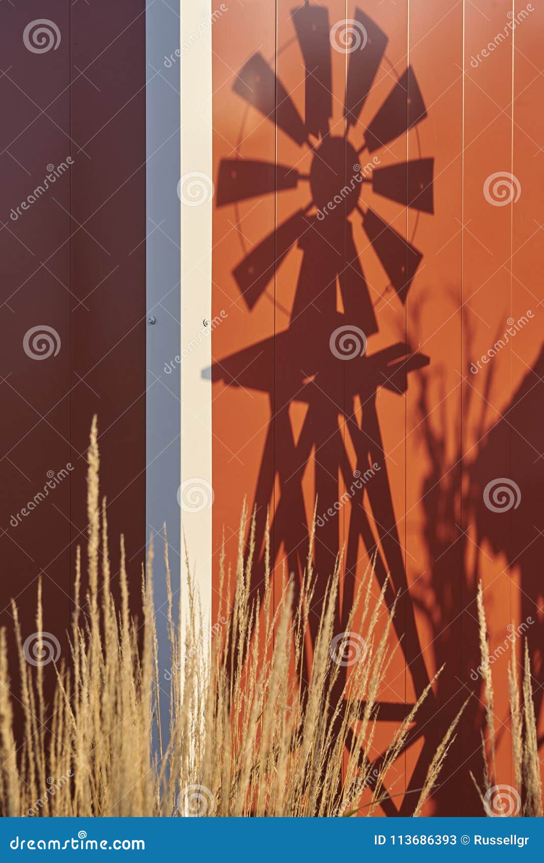 Windmill shadow on barn stock image. Image of barn, vanes - 113686393