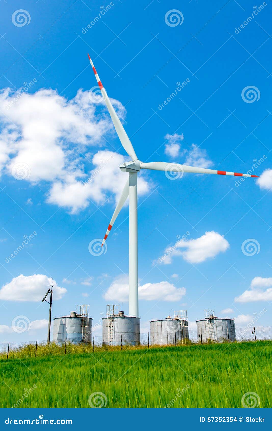 Windmill on the Silos on the Field Stock Photo - Image of farm ...