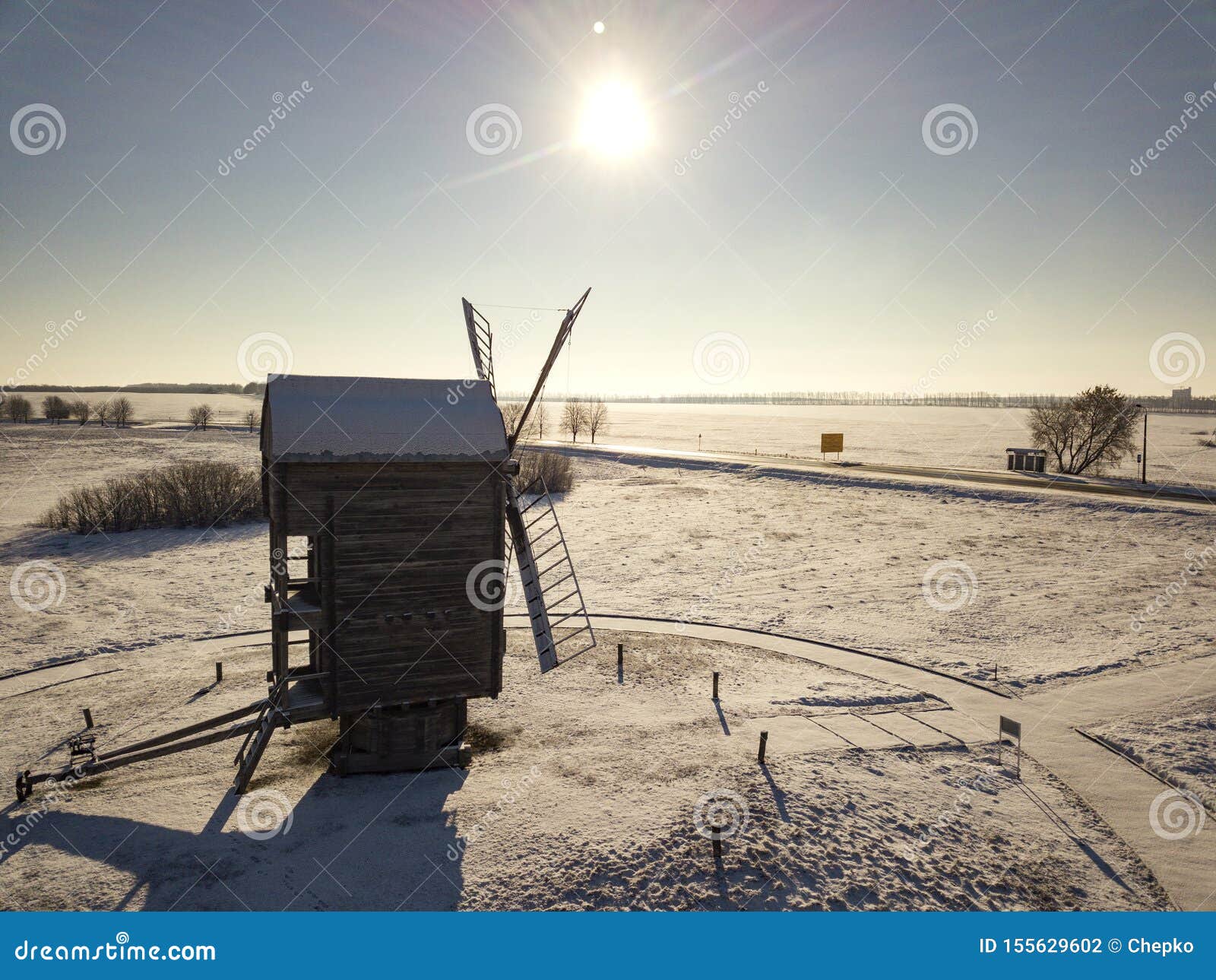 Windmill in the Snow of a Winter Stock Photo - Image of cloud, field ...
