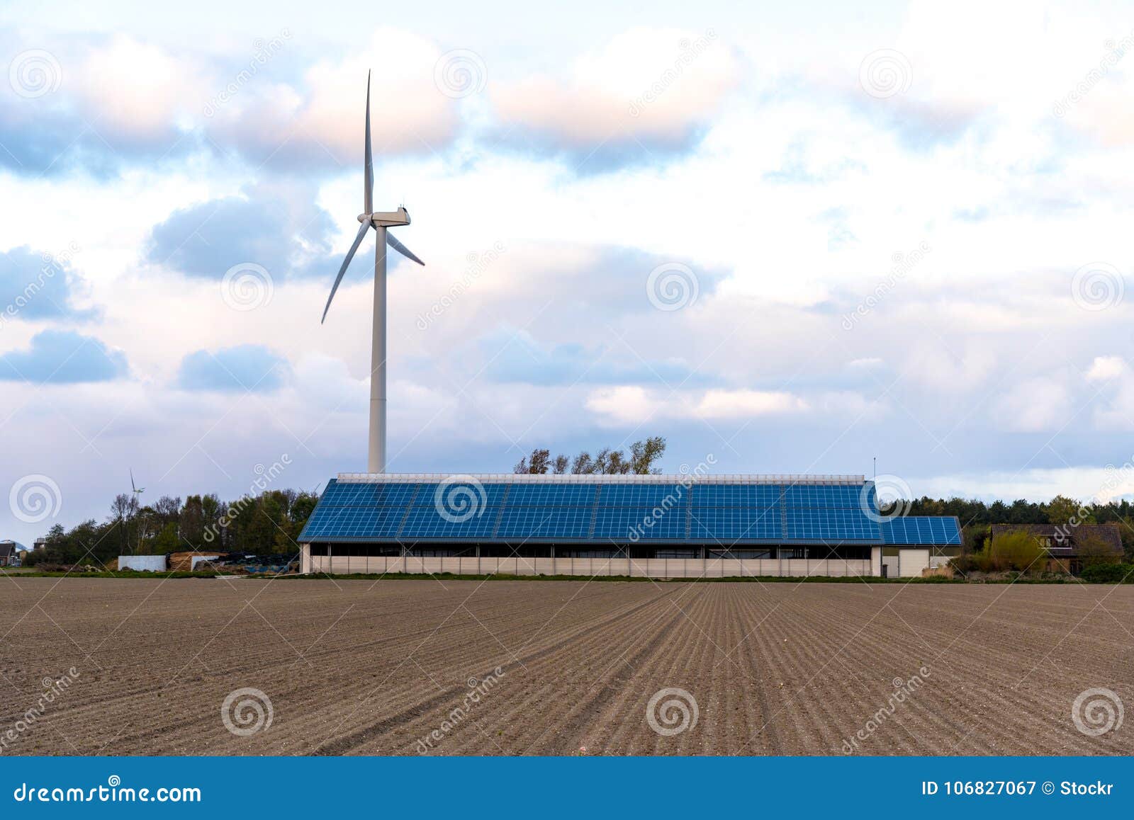 Windmill and solar panel stock image. Image of clean - 106827067