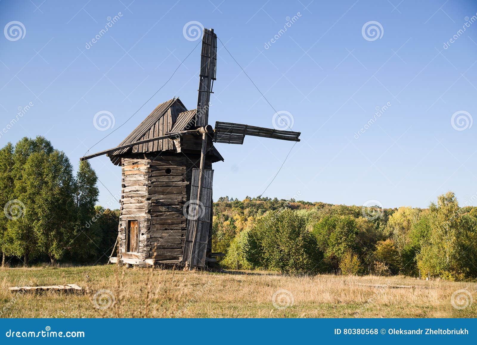 Windmill Standing on the Edge of the Autumn Forest Stock Photo - Image ...