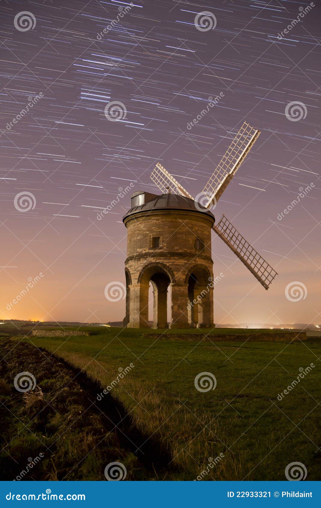 Windmill with star trails stock image. Image of building - 22933321