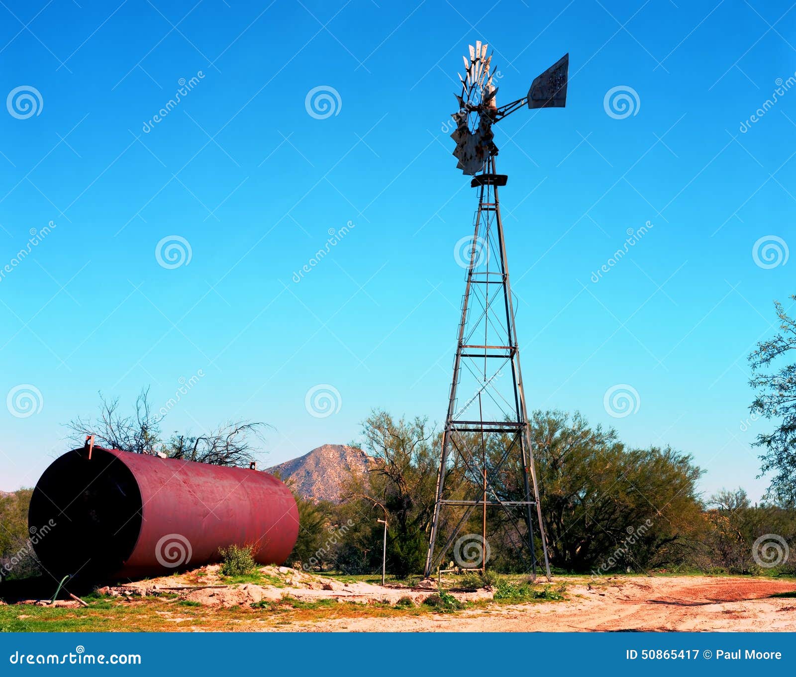 Windmill and Storage Tank stock image. Image of color - 50865417