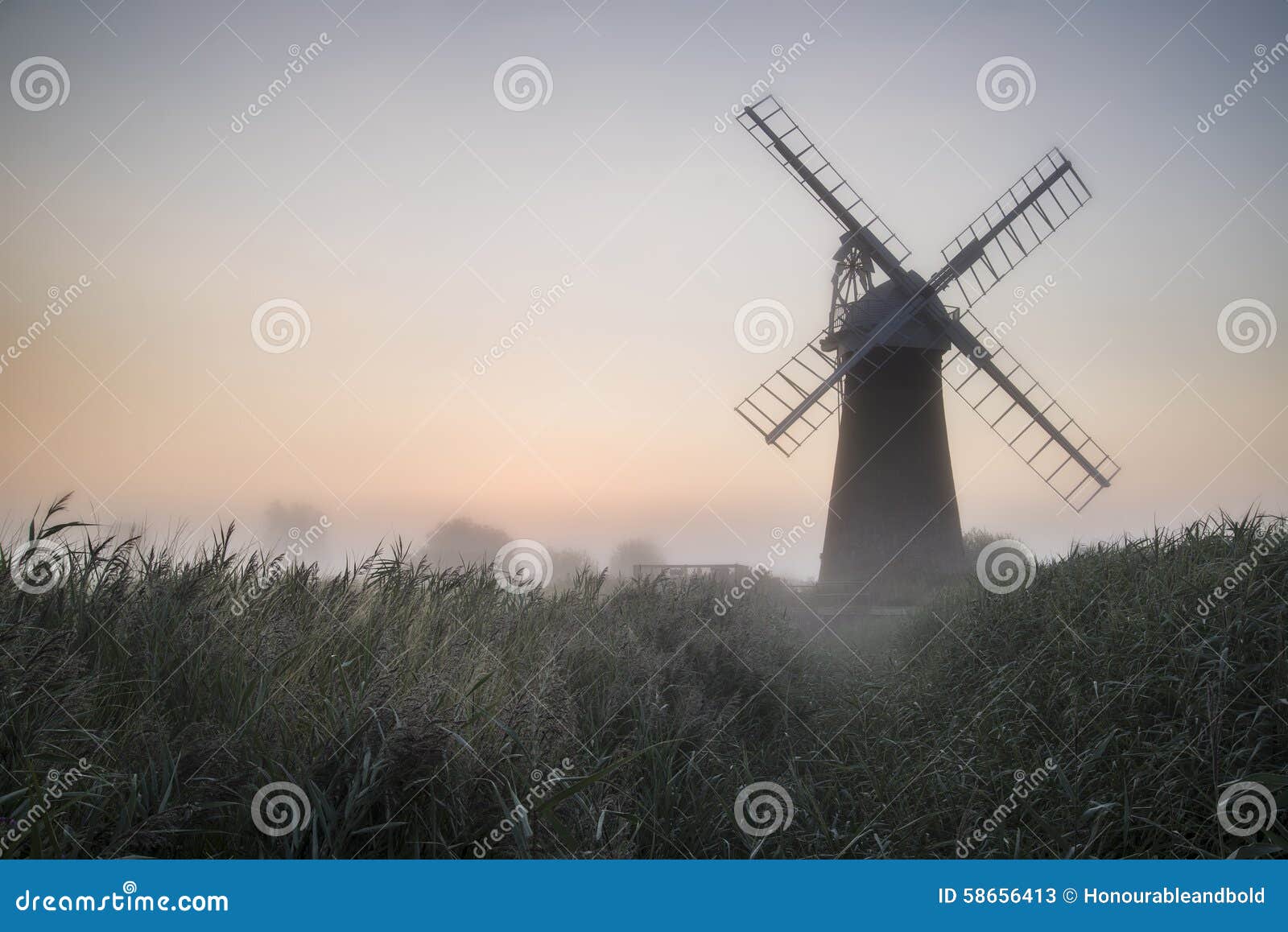 Windmill in Stunning Landscape on Beautiful Summer Dawn Stock Image ...
