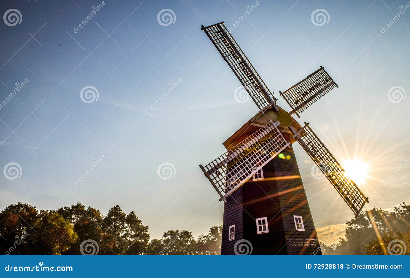 Windmill and the sun stock photo. Image of blue, yellow - 72928818