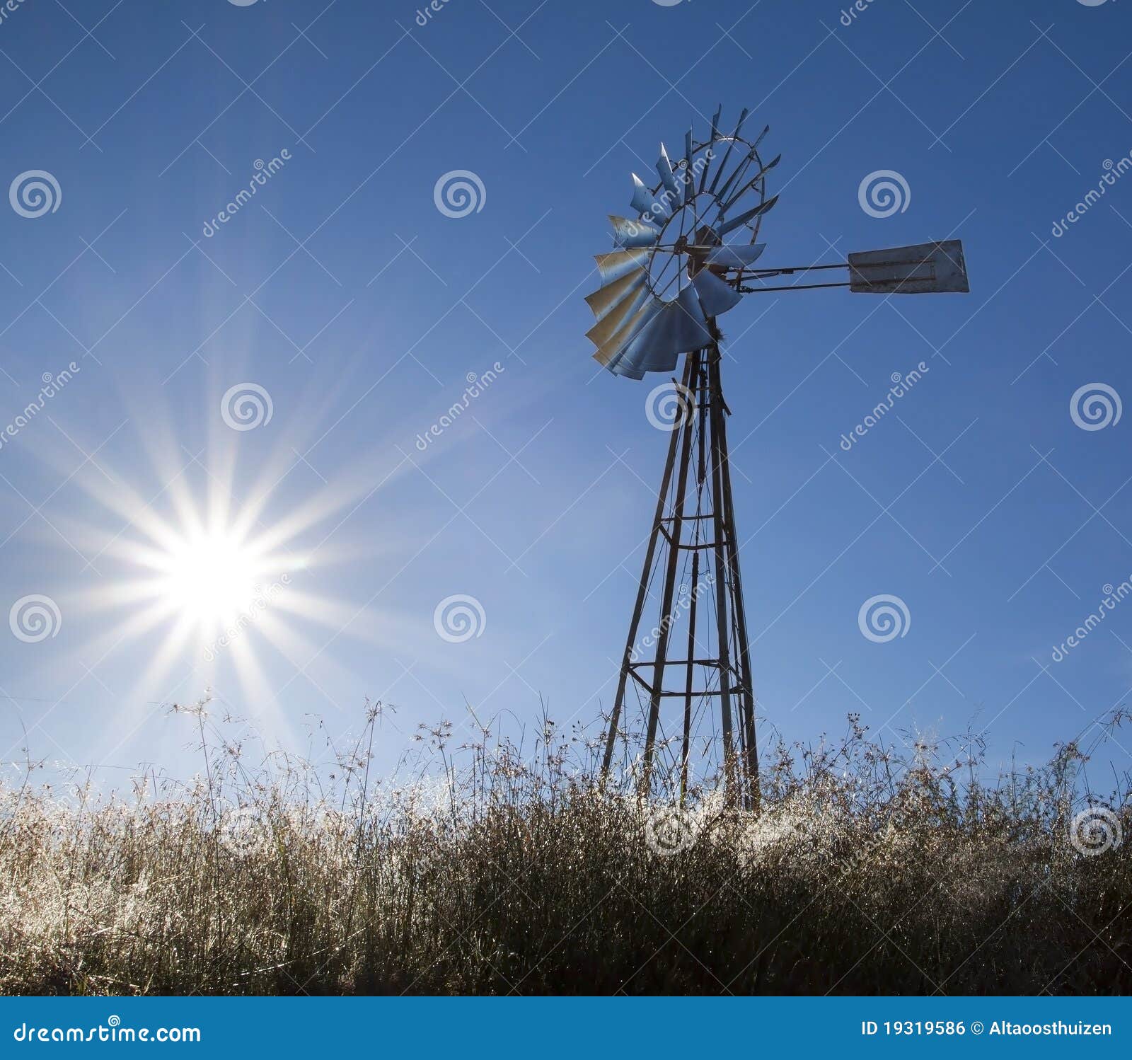 Windmill with Sun Rising Blue Stock Photo - Image of horizon, machine ...