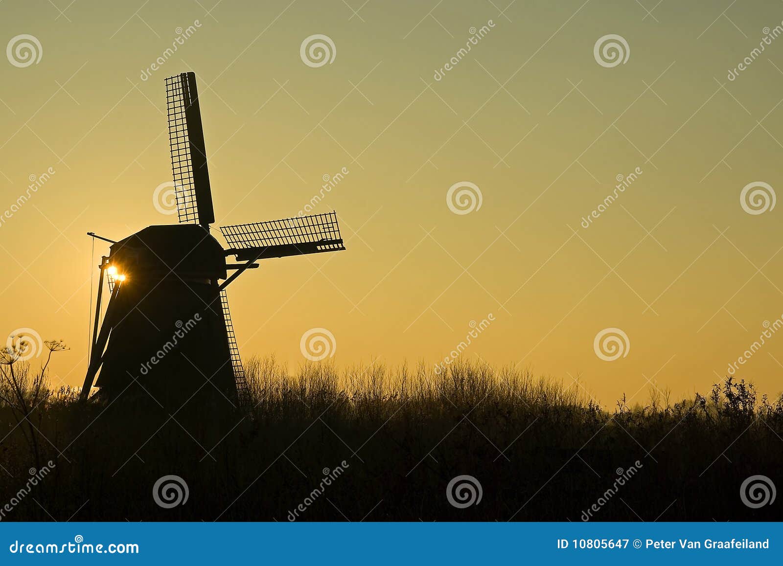 Windmill at sunrise stock image. Image of netherlands - 10805647