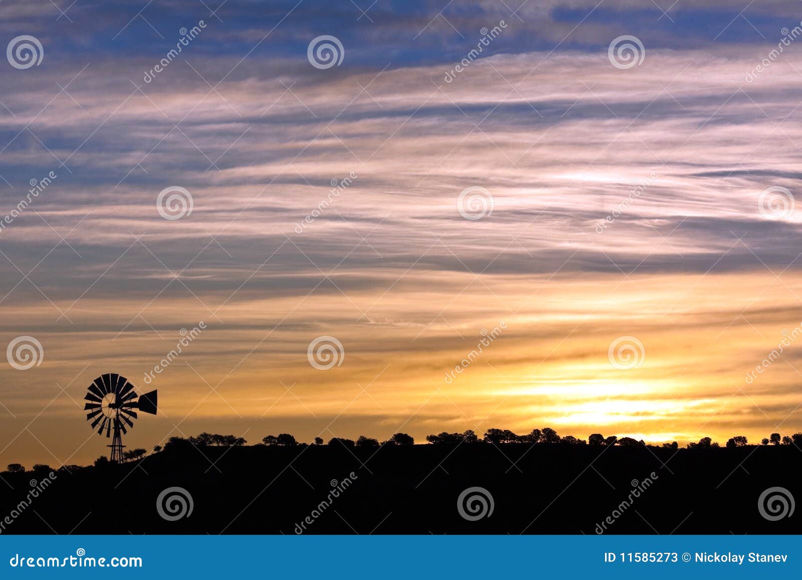 Windmill at Sunrise stock image. Image of landscape, light - 11585273
