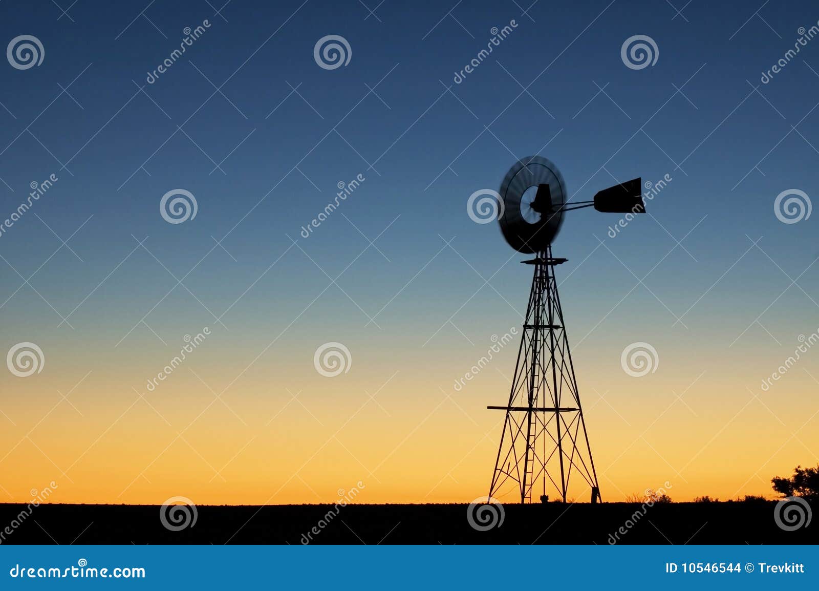 Windmill at sunset stock photo. Image of sunrise, outback - 10546544