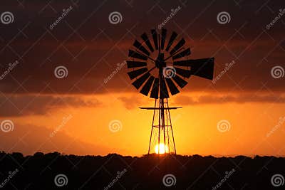 Windmill sunset. stock image. Image of tower, safari, orange - 5138373