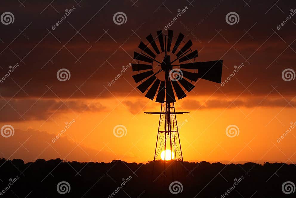 Windmill sunset. stock image. Image of tower, safari, orange - 5138373