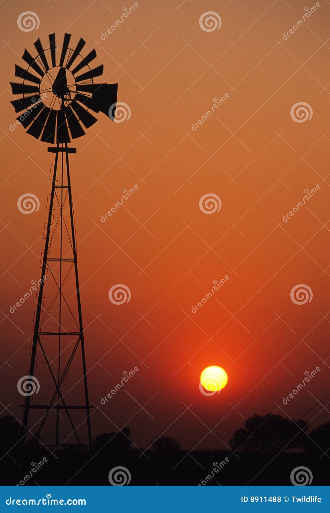 Windmill in the Sunset stock photo. Image of water, sunset - 8911488