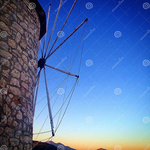 Windmill sunset stock image. Image of greece, kastos - 44379497