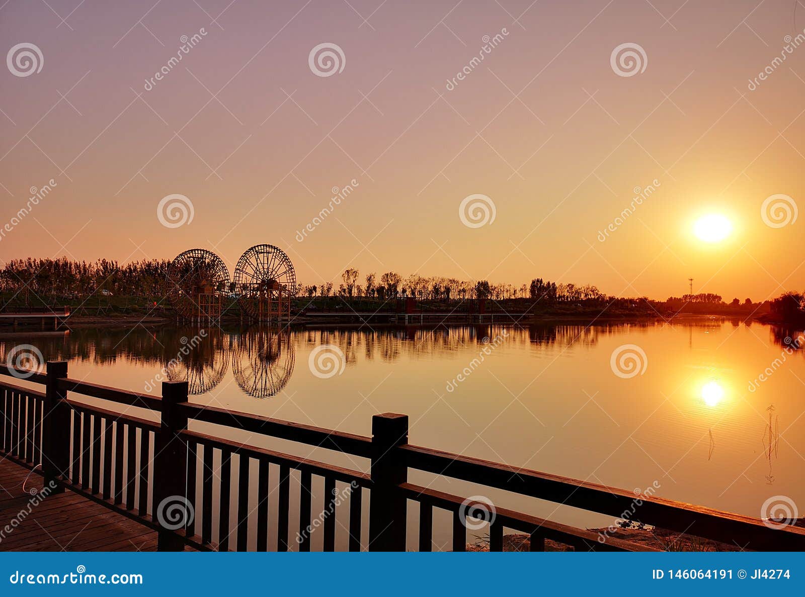 Two Windmills in the Sunset Stock Image - Image of scenery, windmill ...