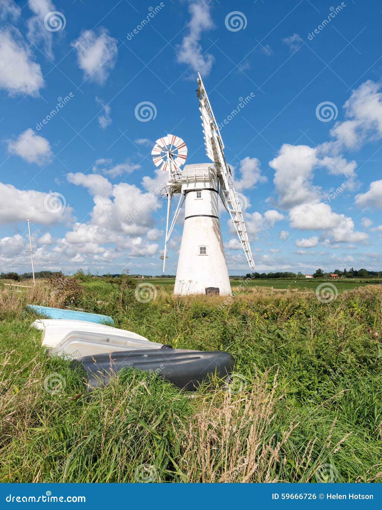 The Windmill at Thurne in Norfolk Stock Photo - Image of clouds ...