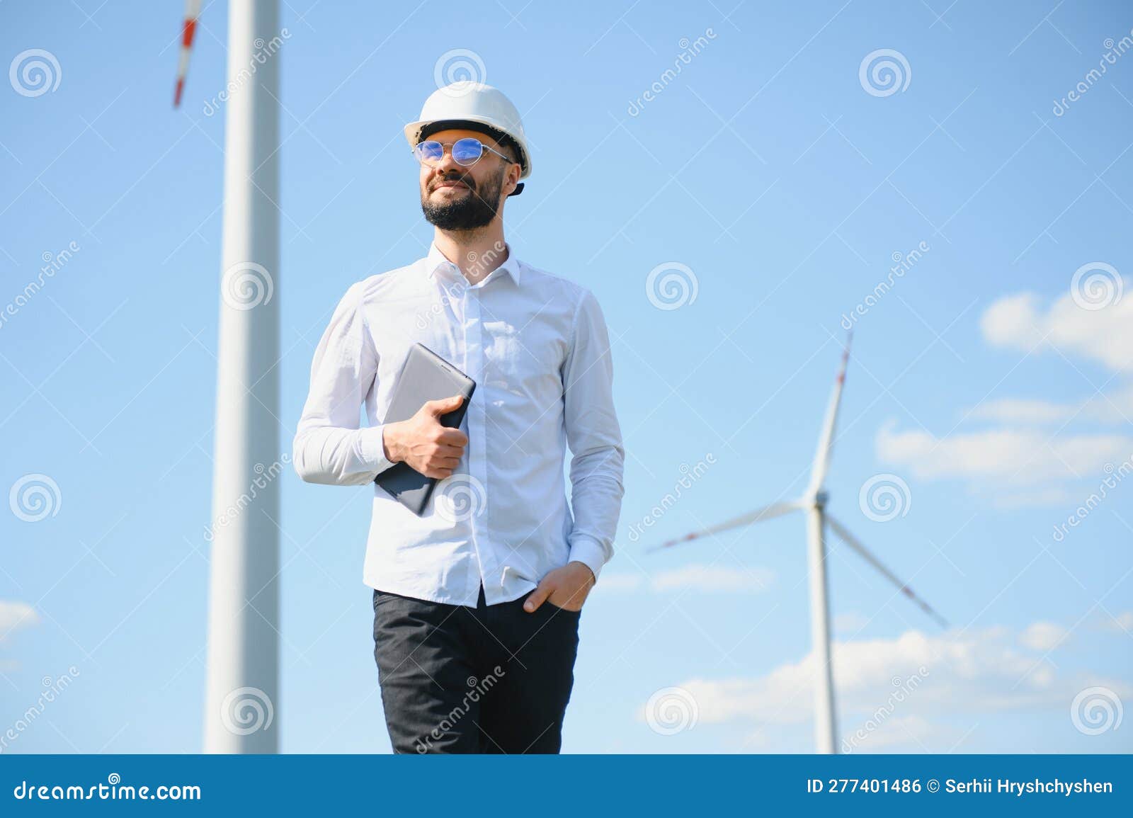 Windmill Turbine Maintenance Engineer Standing at Wind Farm. Stock ...