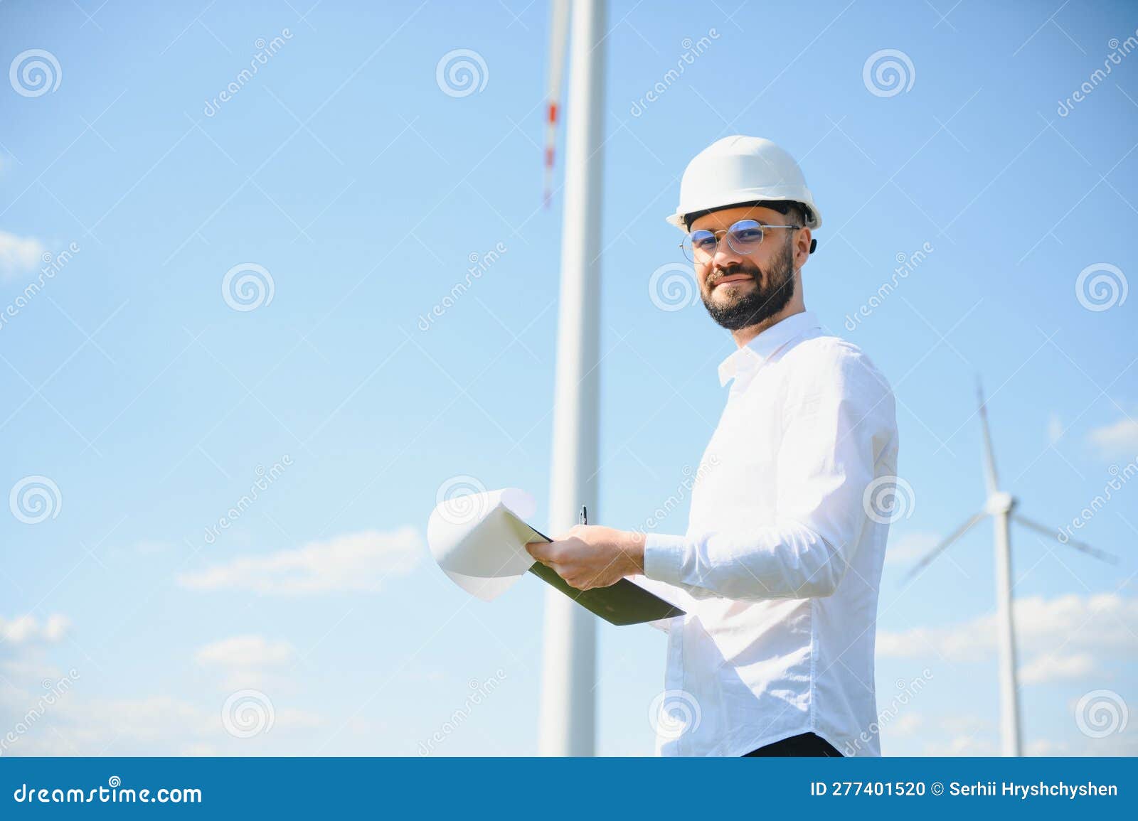Windmill Turbine Maintenance Engineer Standing at Wind Farm. Stock ...
