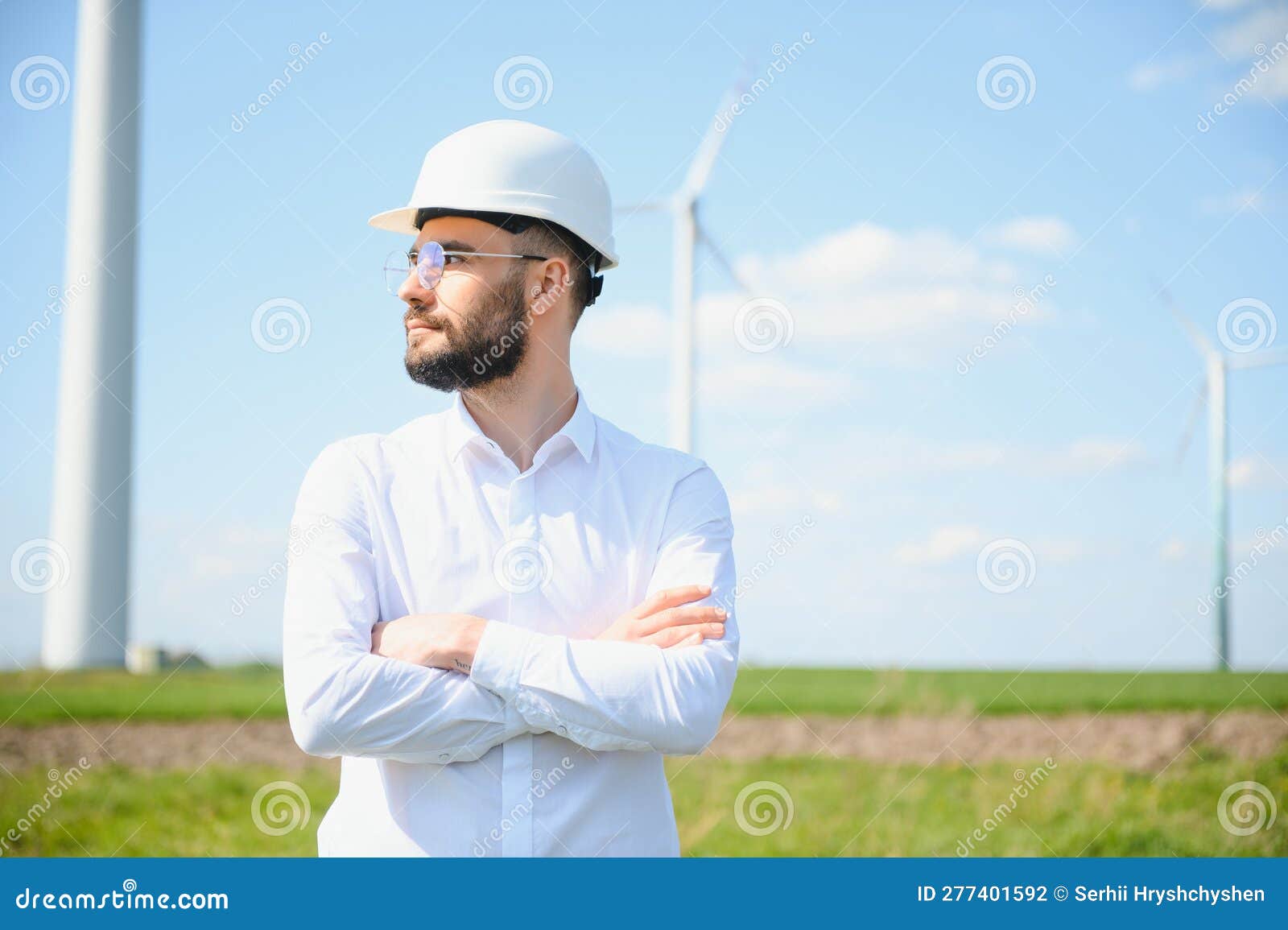 Windmill Turbine Maintenance Engineer Standing at Wind Farm. Stock ...