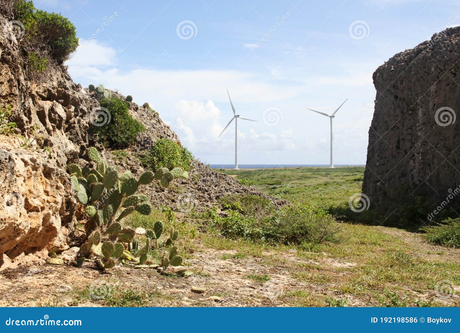Windmill Turbines and Rocks in Aruba Stock Photo - Image of propeller ...