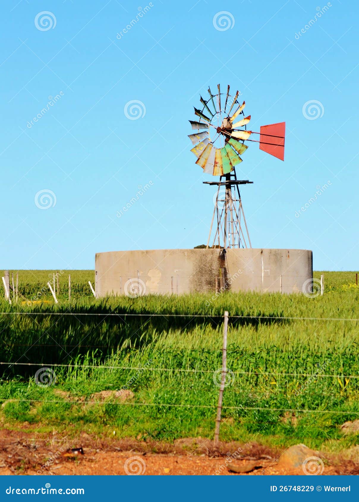 Windmill water pump stock image. Image of meadow, pump - 26748229