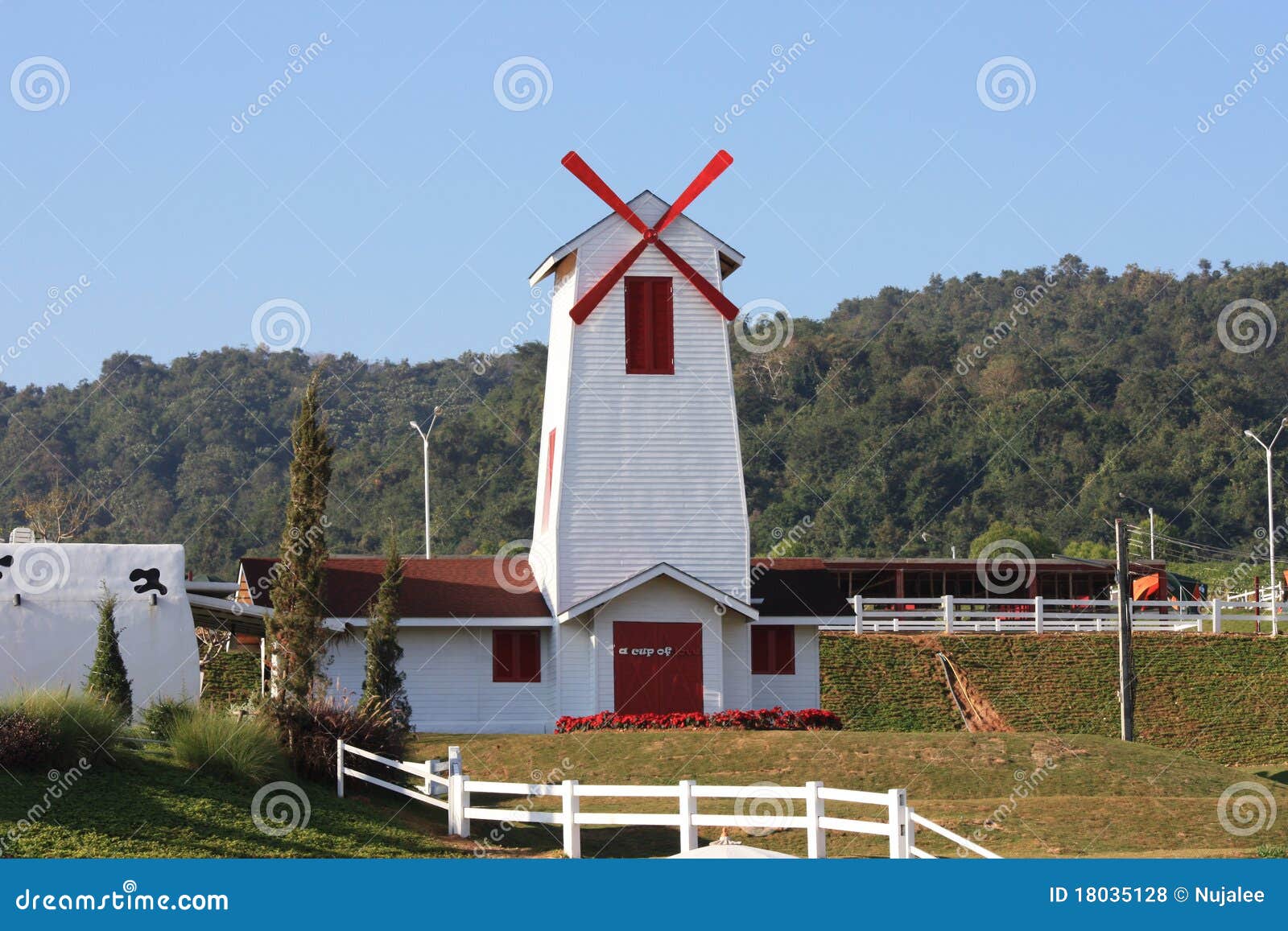 Windmill on a White Building Stock Photo - Image of conservation ...