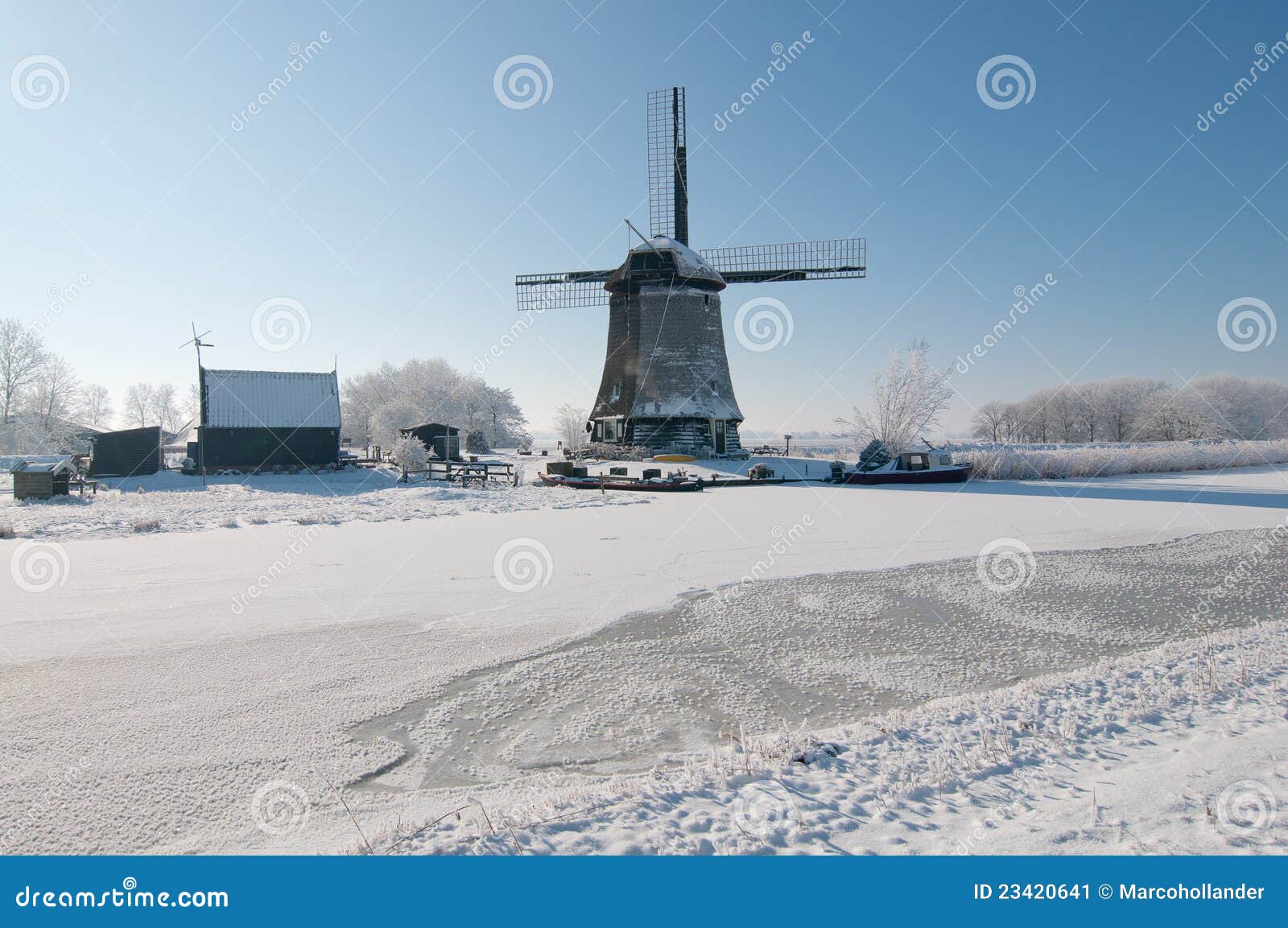 Windmill in winter scenery stock image. Image of trees - 23420641