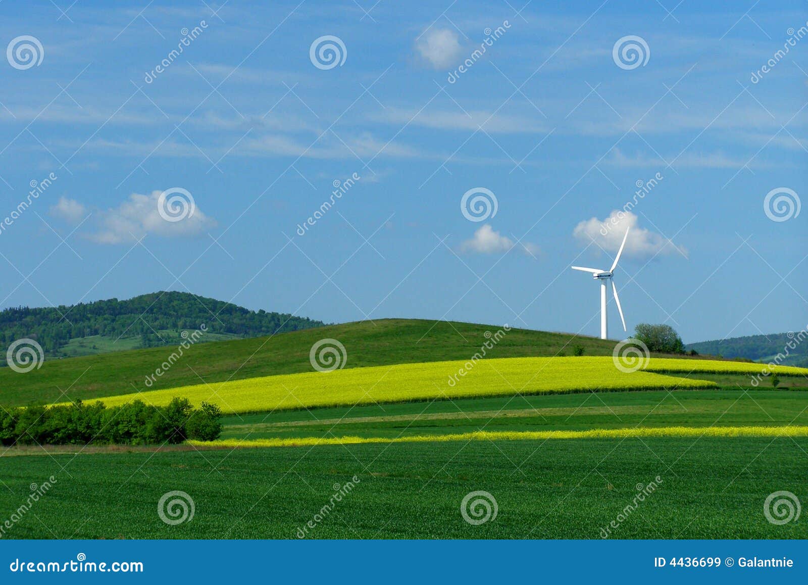 Windmill on a Yellow-green Field Stock Image - Image of generate, blue ...