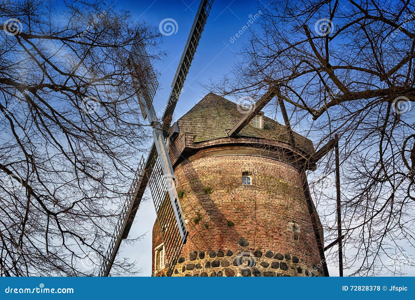 Windmill in Zons am Rhein stock photo. Image of railing - 72828378