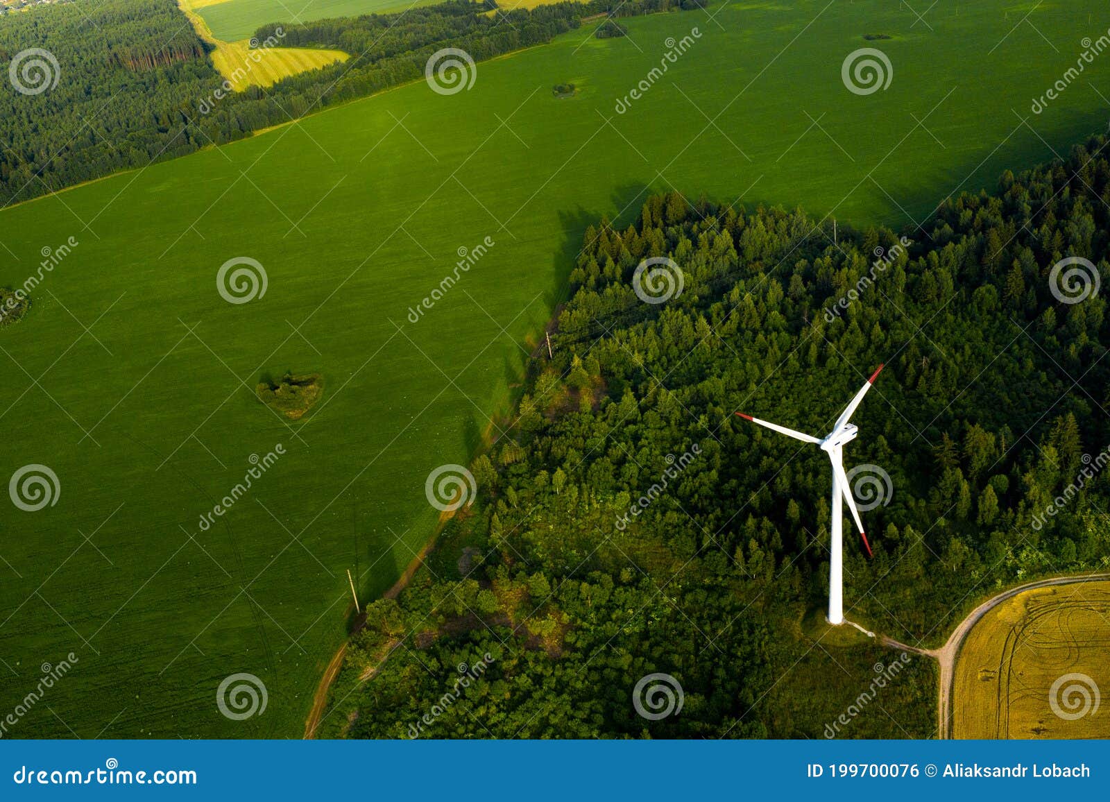 Windmills on the Background of Forests and Fields. Windmill in Nature ...