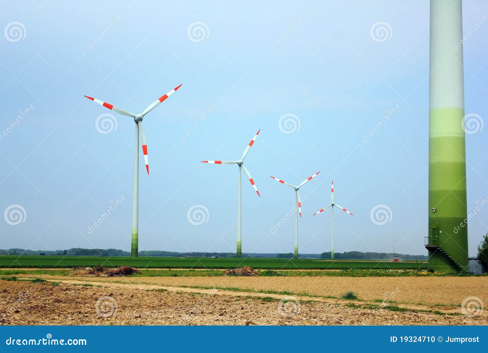 Windmills in the field stock photo. Image of turbine - 19324710