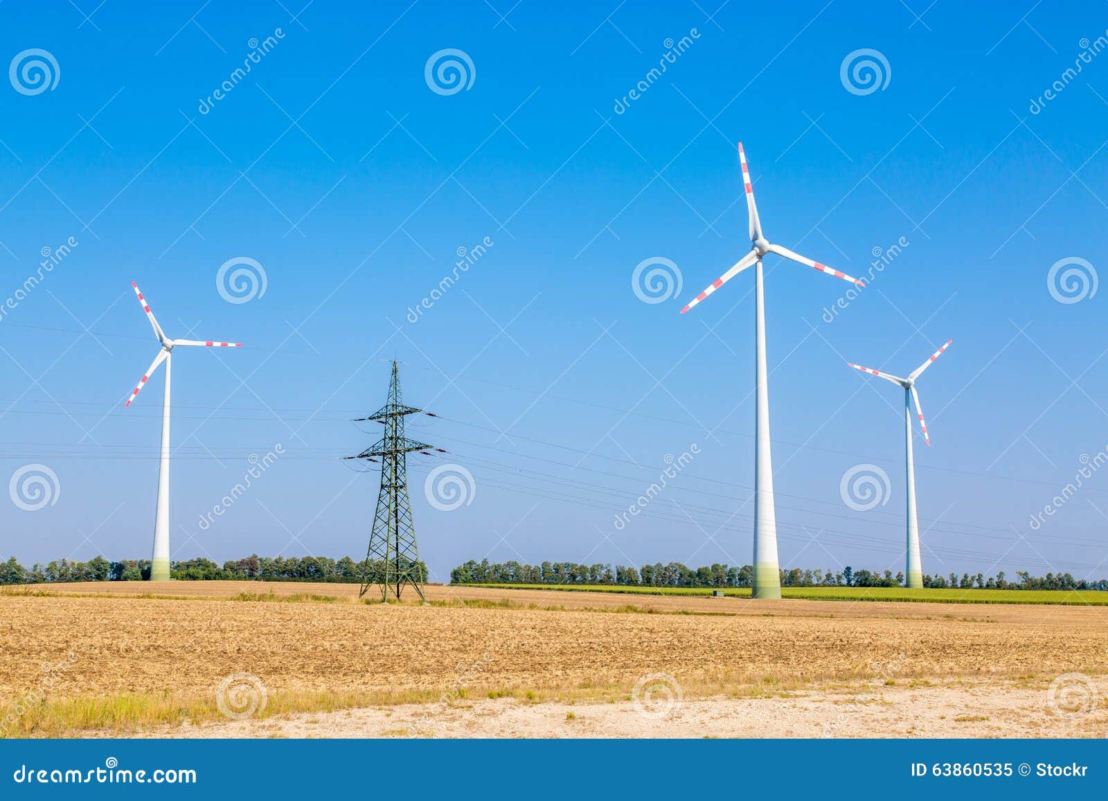 Windmills on the field stock image. Image of cable, high - 63860535
