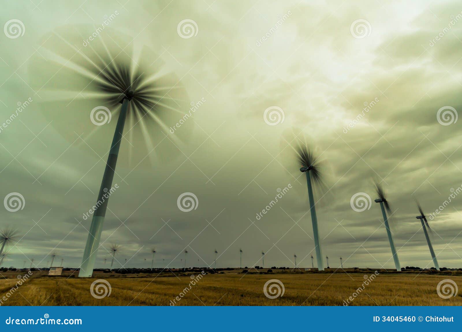 Windmills at night stock photo. Image of electricity - 34045460