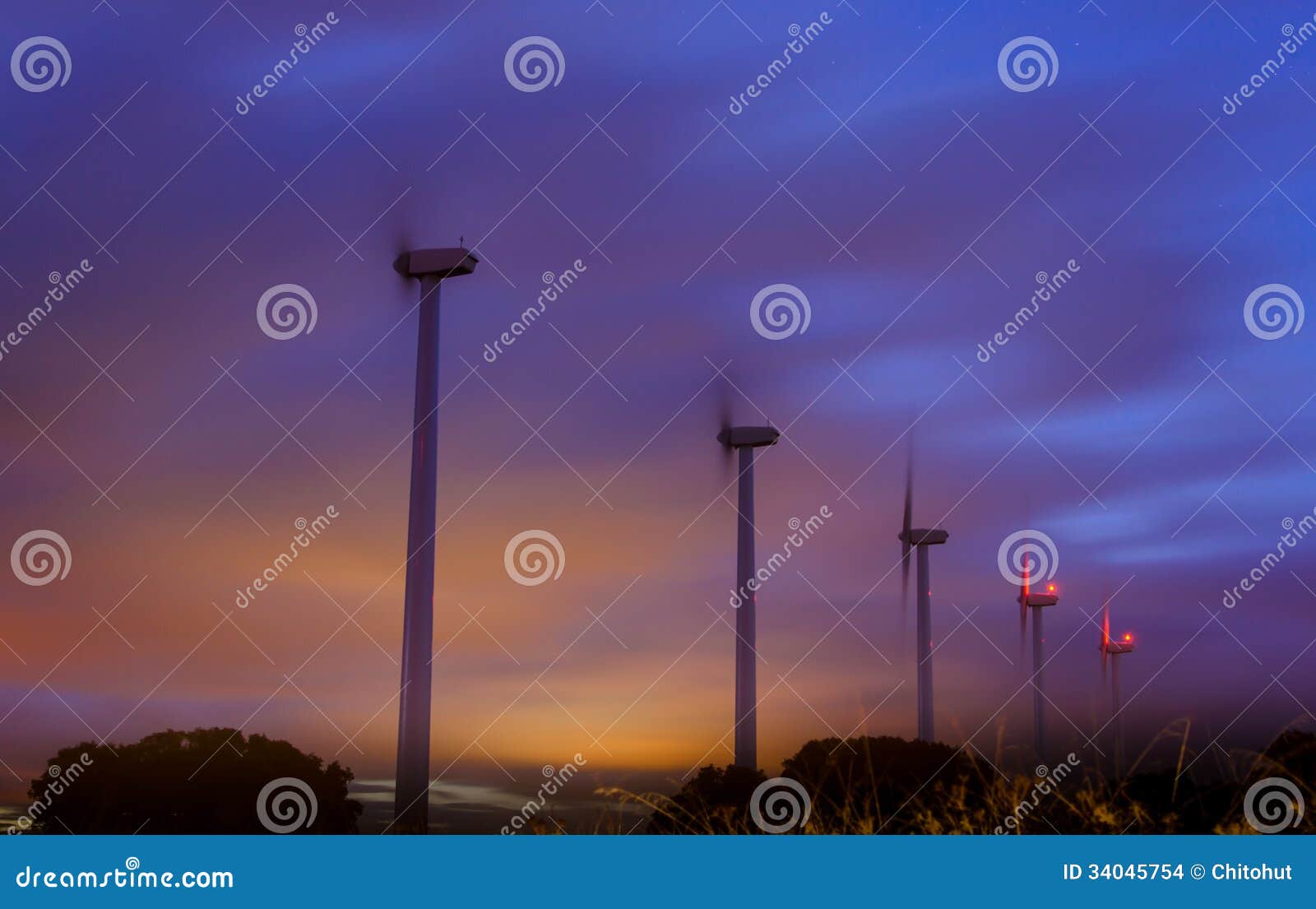 Windmills at night stock photo. Image of group, efficiency - 34045754