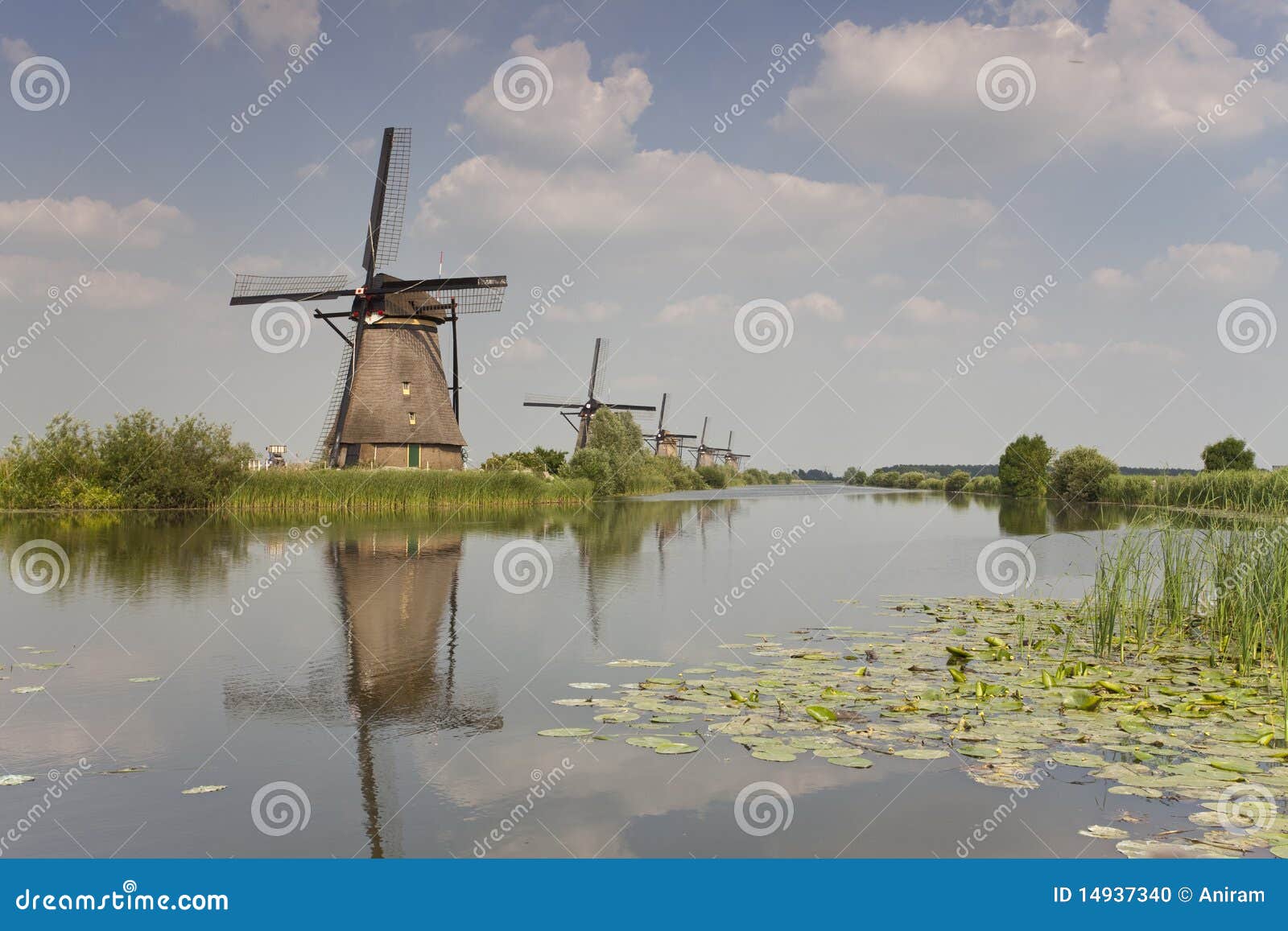 Windmills on river stock photo. Image of kinderdijk, dutch - 14937340