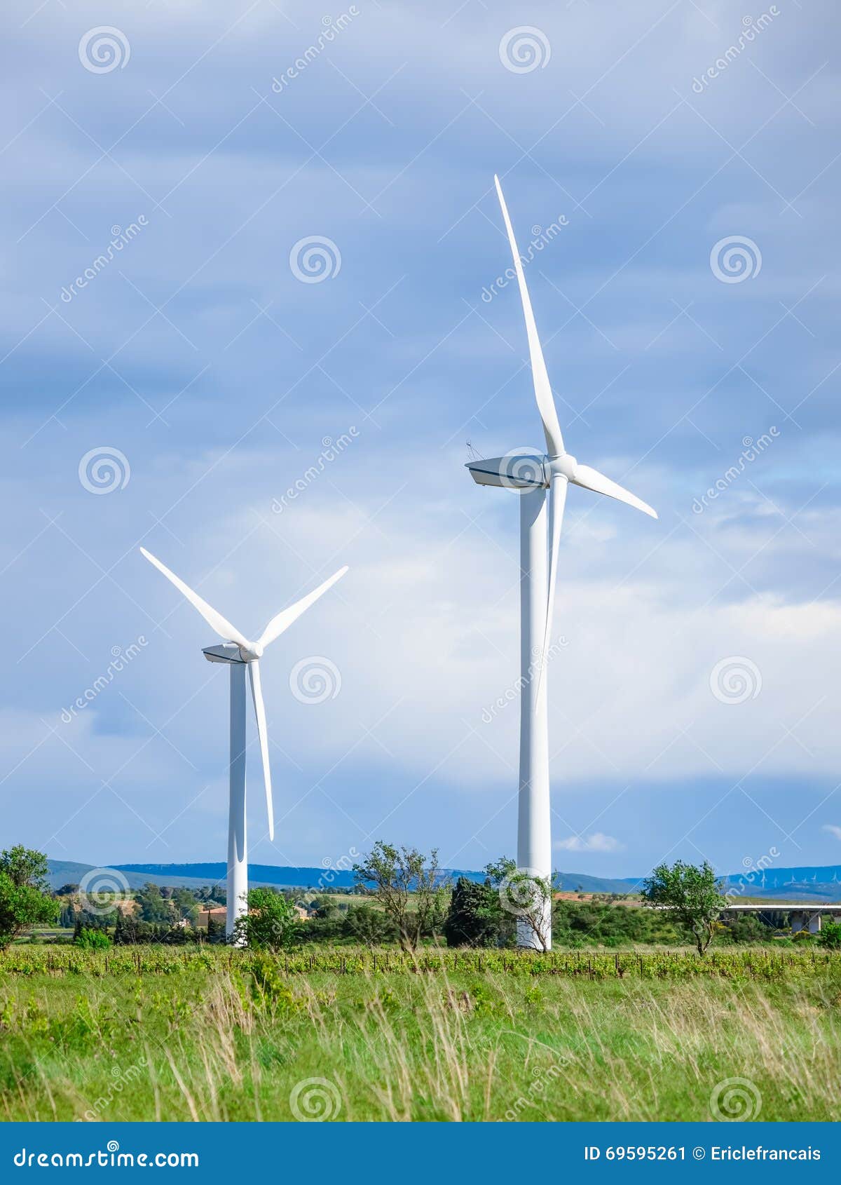Windmills Standing in Fields in Summer Stock Image - Image of fields ...