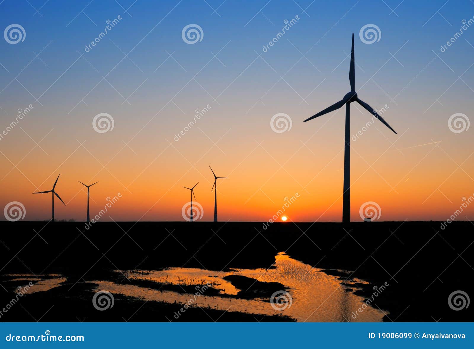Windmills at sunset stock image. Image of windmills, wind - 19006099