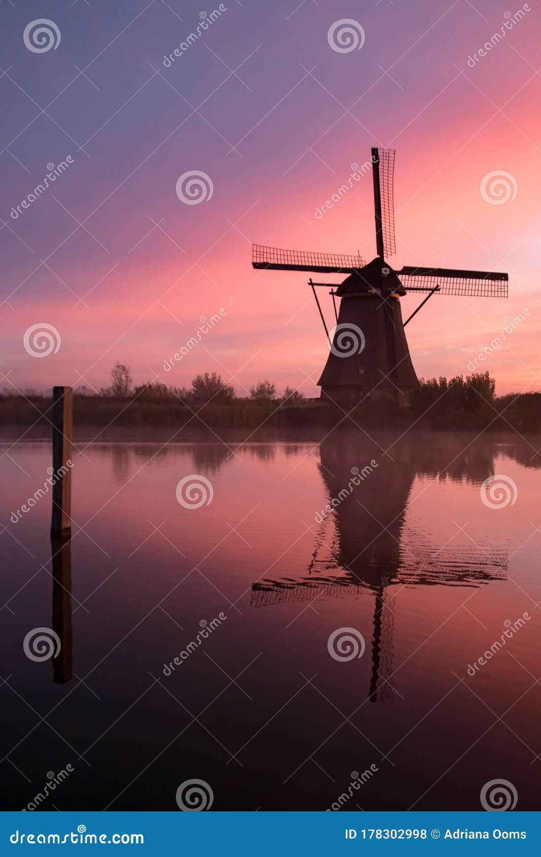 Windmills at sunset stock photo. Image of europe, morning - 178302998