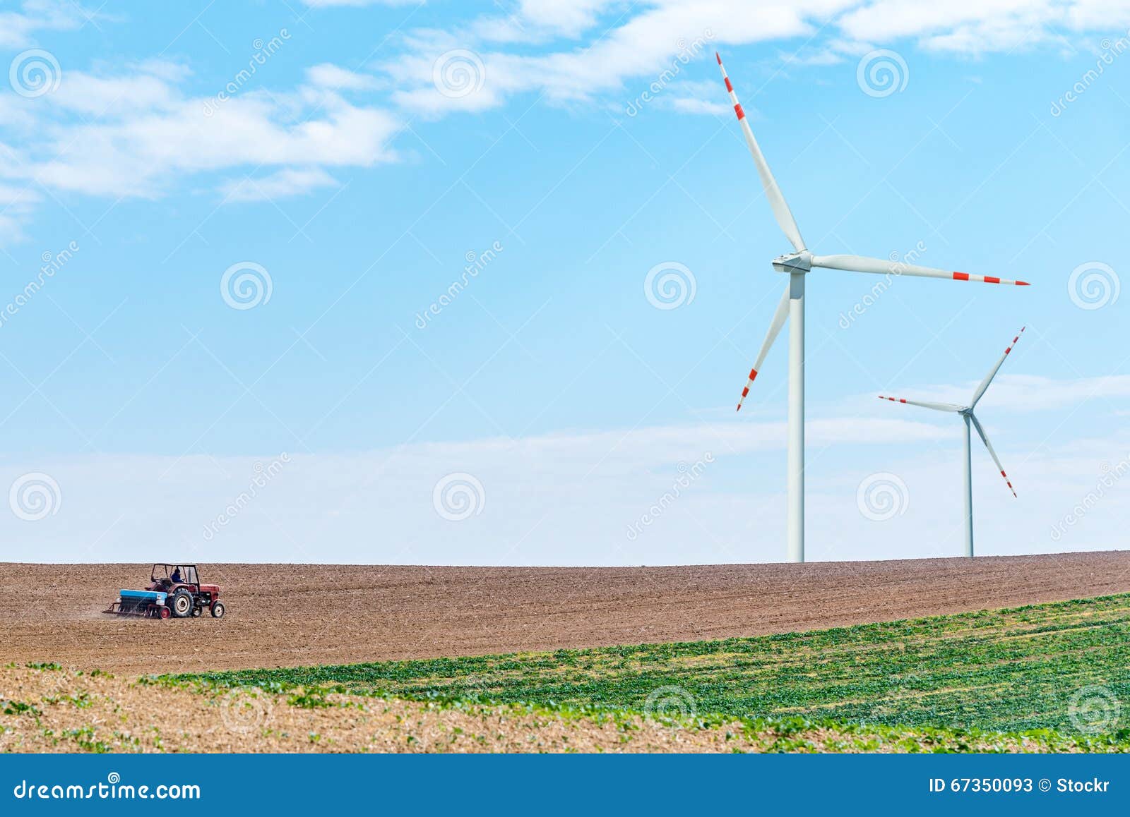Windmills and Tractor on the Field Stock Image - Image of farming, farm ...