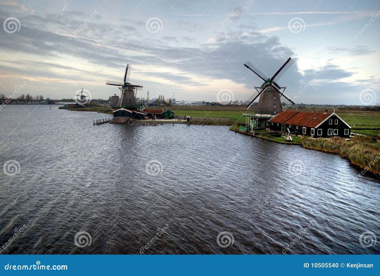 Windmills by the water stock photo. Image of typical - 10505540