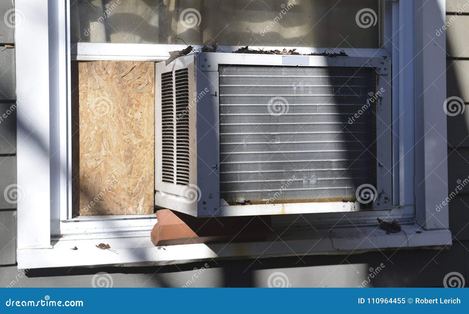 A Window And A Air Conditioner On The Grey Brick Wall Background ...