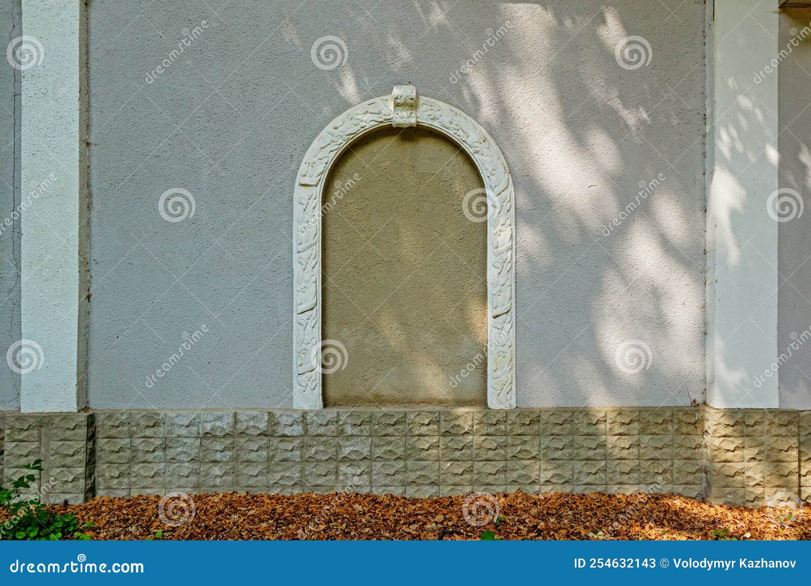 Window with an Arch of an Old House with a Light Facade. the Window is ...