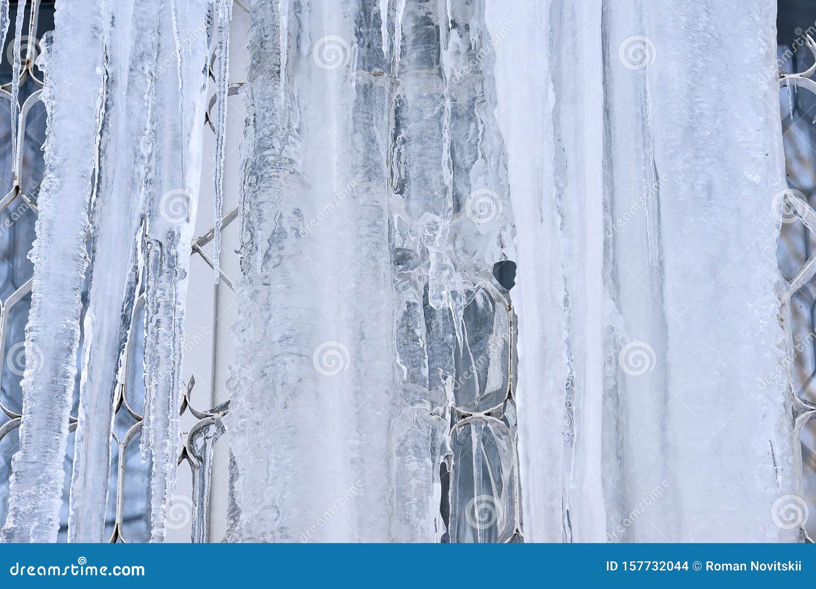 Window with Bars Under a Thick Layer of Ice. Background Stock Photo ...