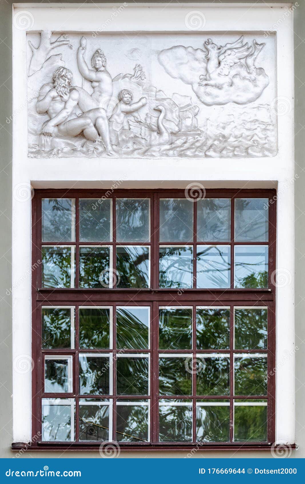 Window with a bas-relief stock photo. Image of people - 176669644