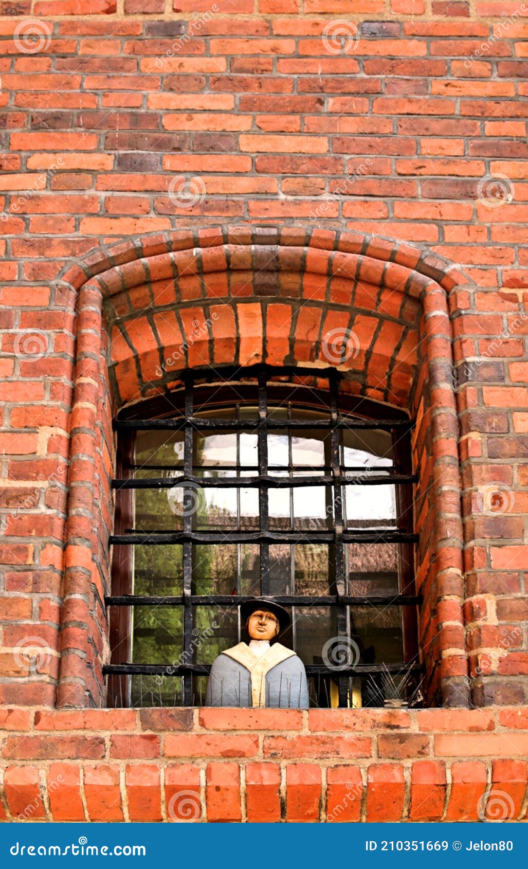 Window Behind Bars in a Historic Building with Lighting in Torun ...