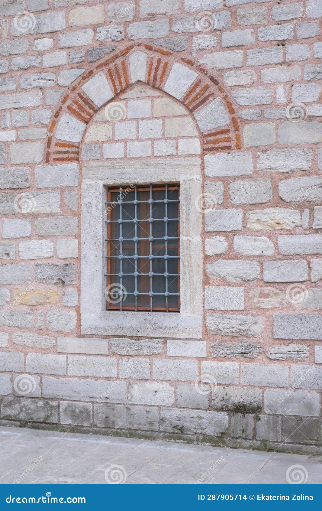 Window on a Brick Wall Under Brick Arch Stock Photo - Image of orange ...