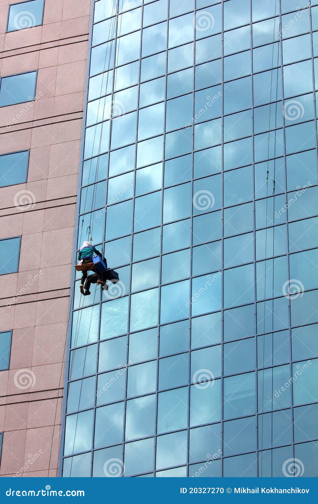 Window cleaner at work stock photo. Image of office, building - 20327270