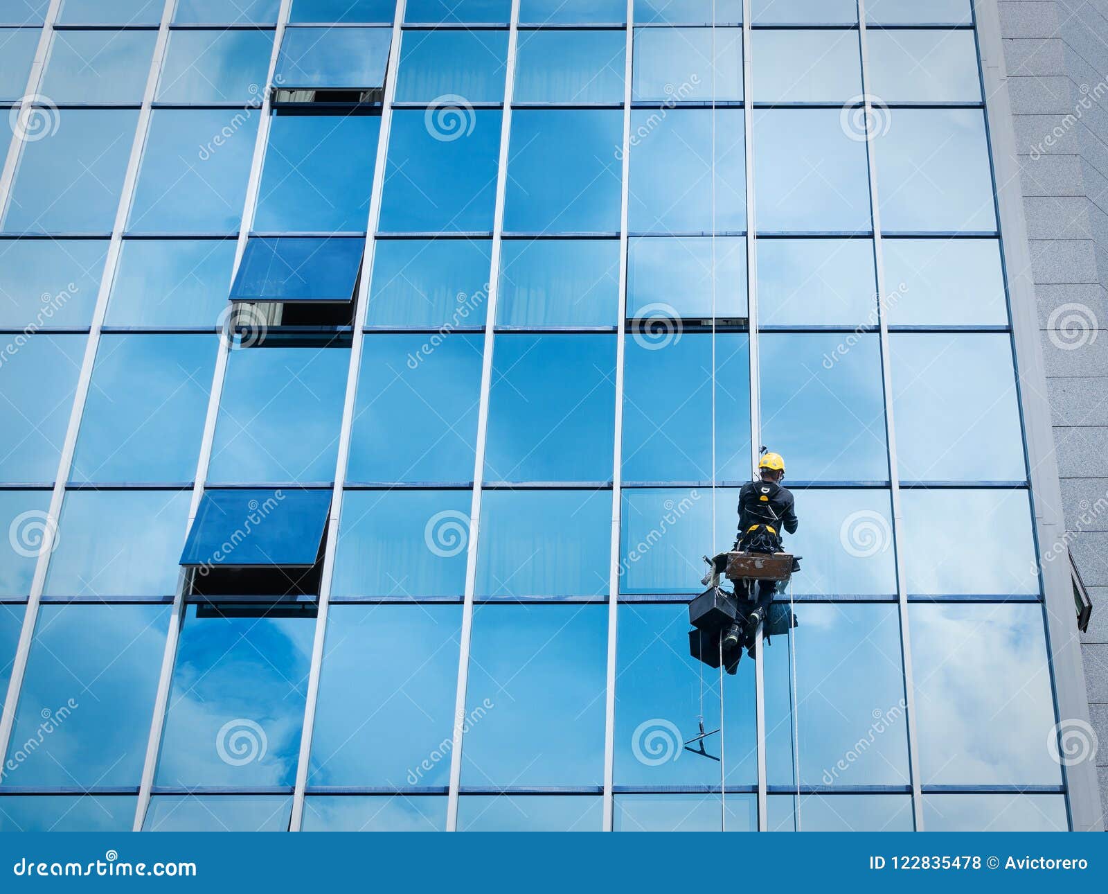 Window cleaner suspended. stock photo. Image of skyline - 122835478