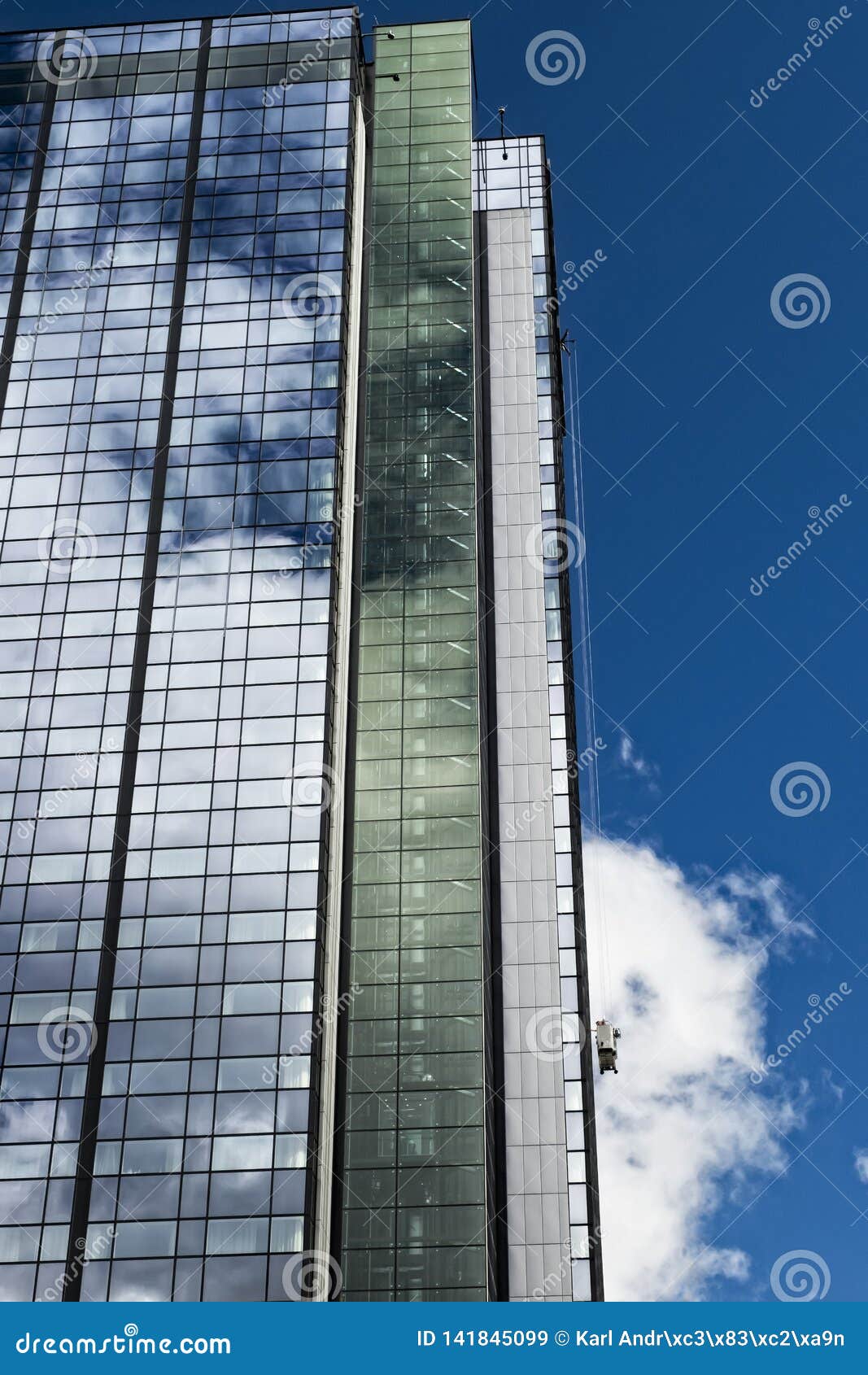 A Skyscraper with Window-cleaners High Up. Stock Image - Image of ...